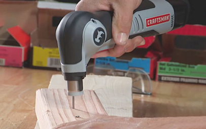 Automatic Hammer: An auto power tool to drive nails in tight spaces
