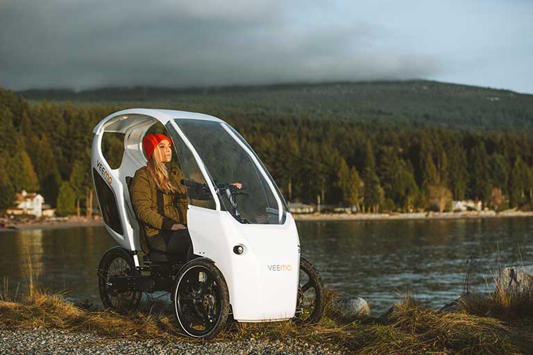 The Veemo pedal-electric Velomobile has city-friendly dimensions