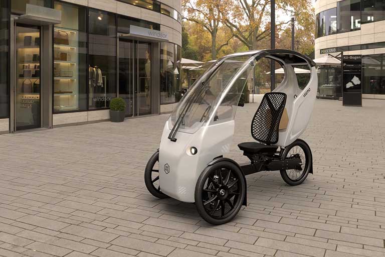 The Veemo pedal-electric Velomobile has city-friendly dimensions
